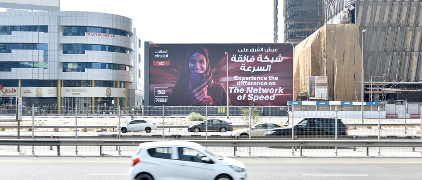 Advertise on SZR Hoarding Tesla | OOH advertising